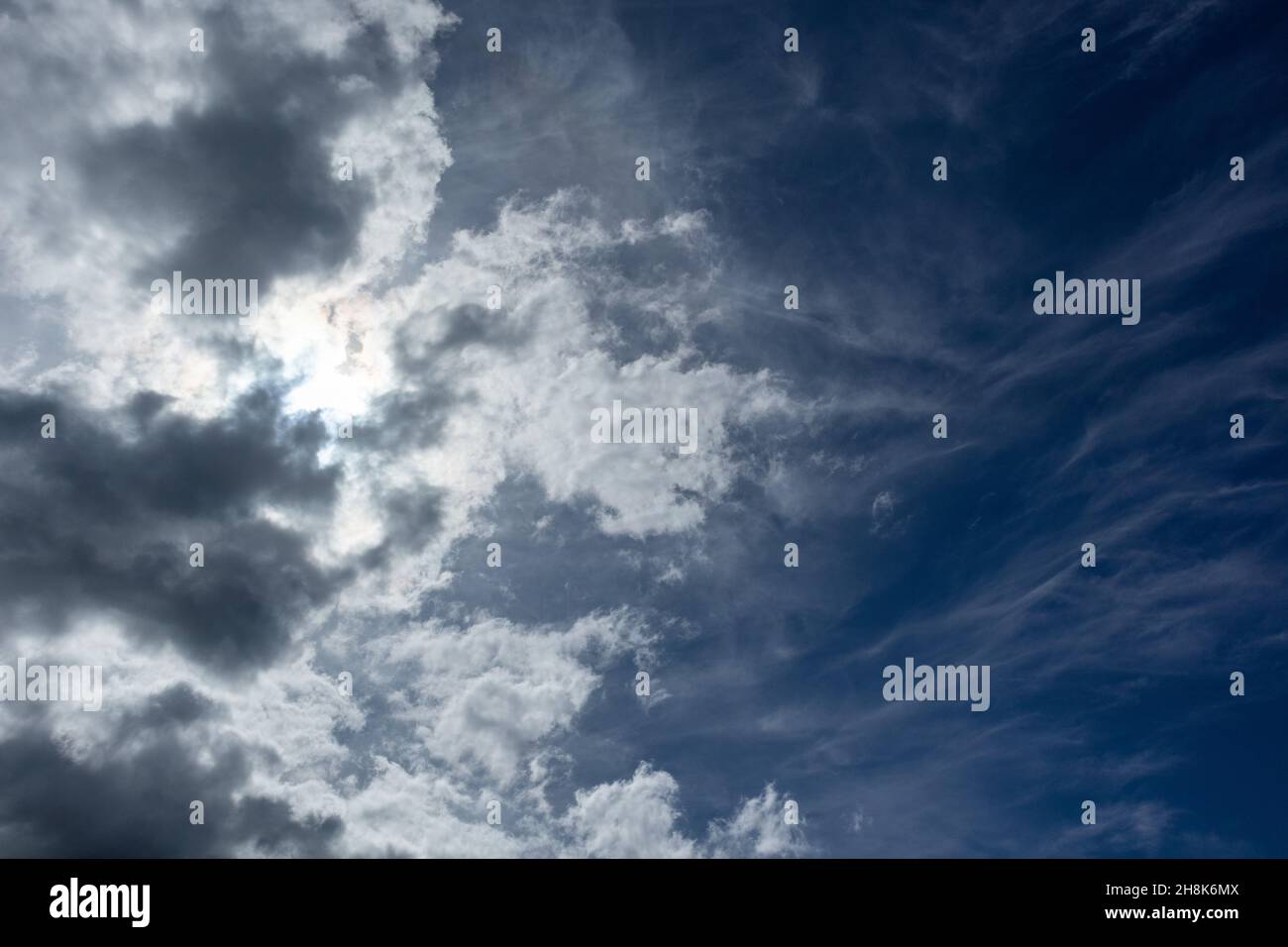 Sun shining on stormy sky with heavy cloudscape background. Skyscape ...