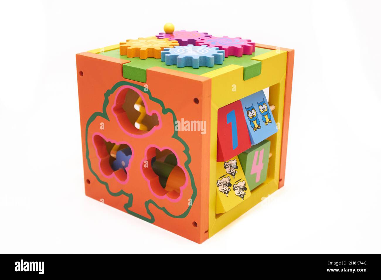 motor skills for children. wooden sensory cube for toddlers Stock Photo ...
