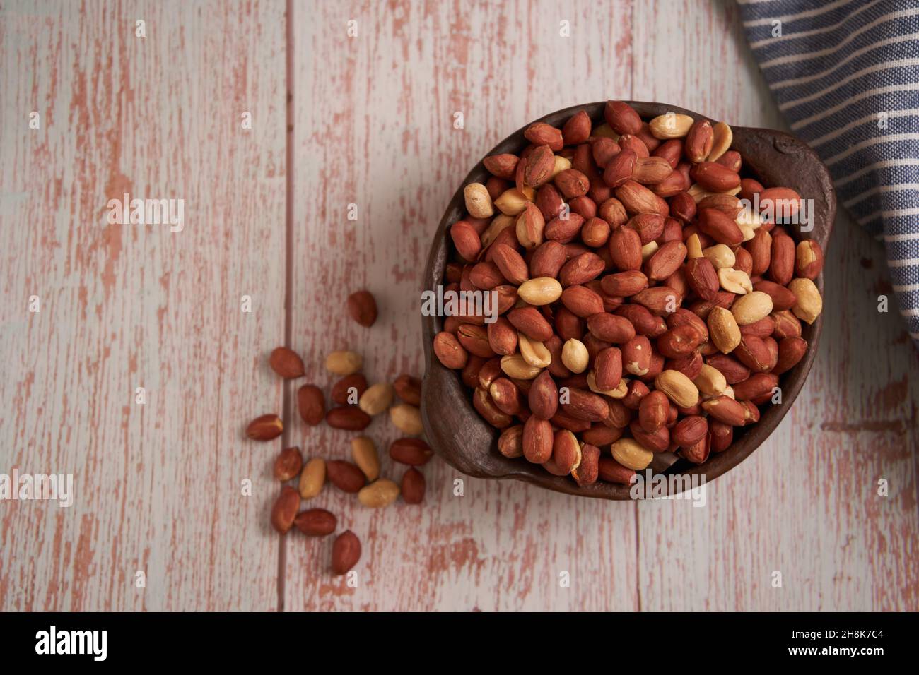 Peanut on wooden pot hi-res stock photography and images - Alamy