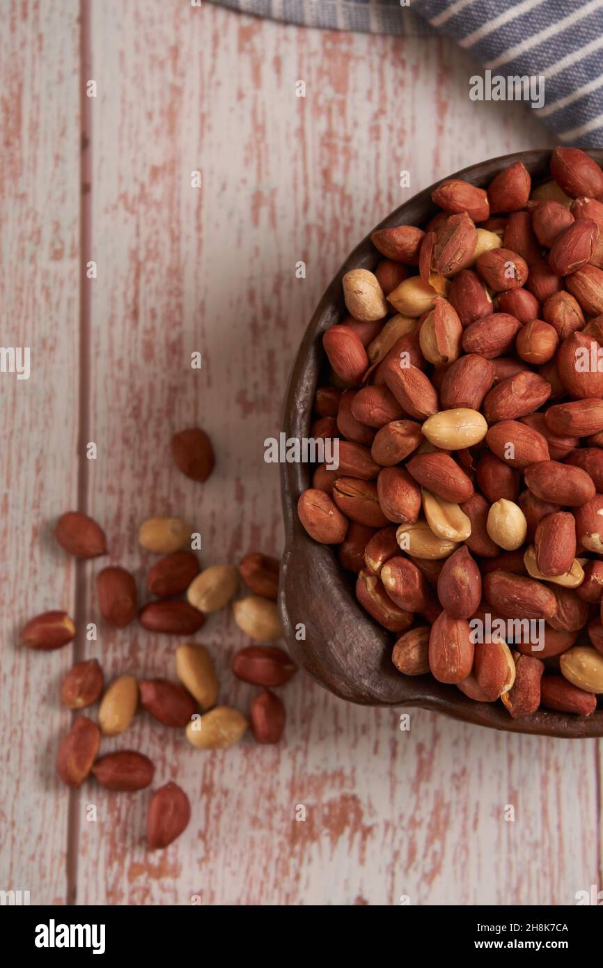Peanut on wooden pot hi-res stock photography and images - Alamy