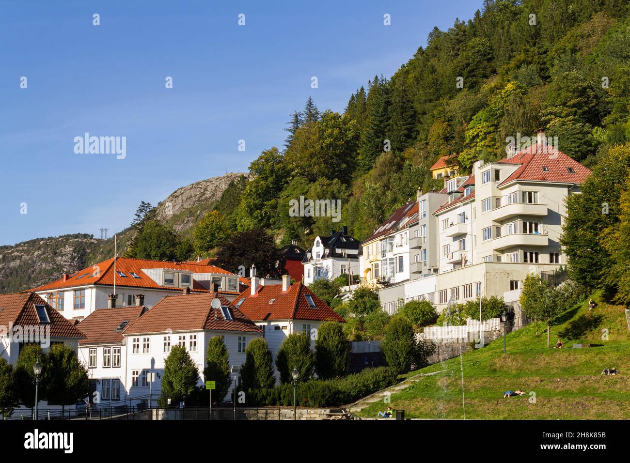 People enjoying the sun on Bergen hillside, Norway Stock Photo - Alamy