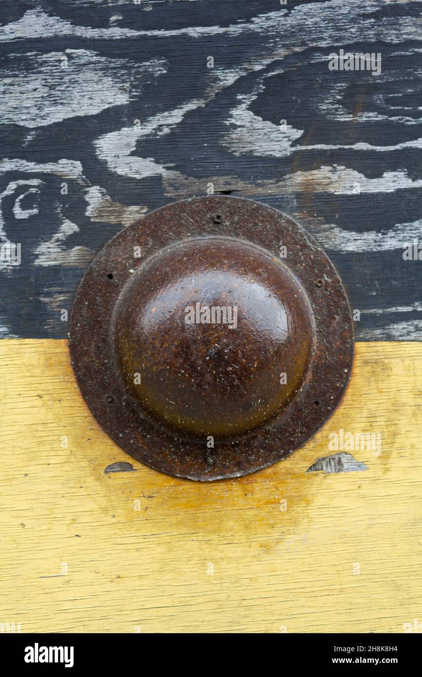 Iron shield on vintage wall Stock Photo - Alamy