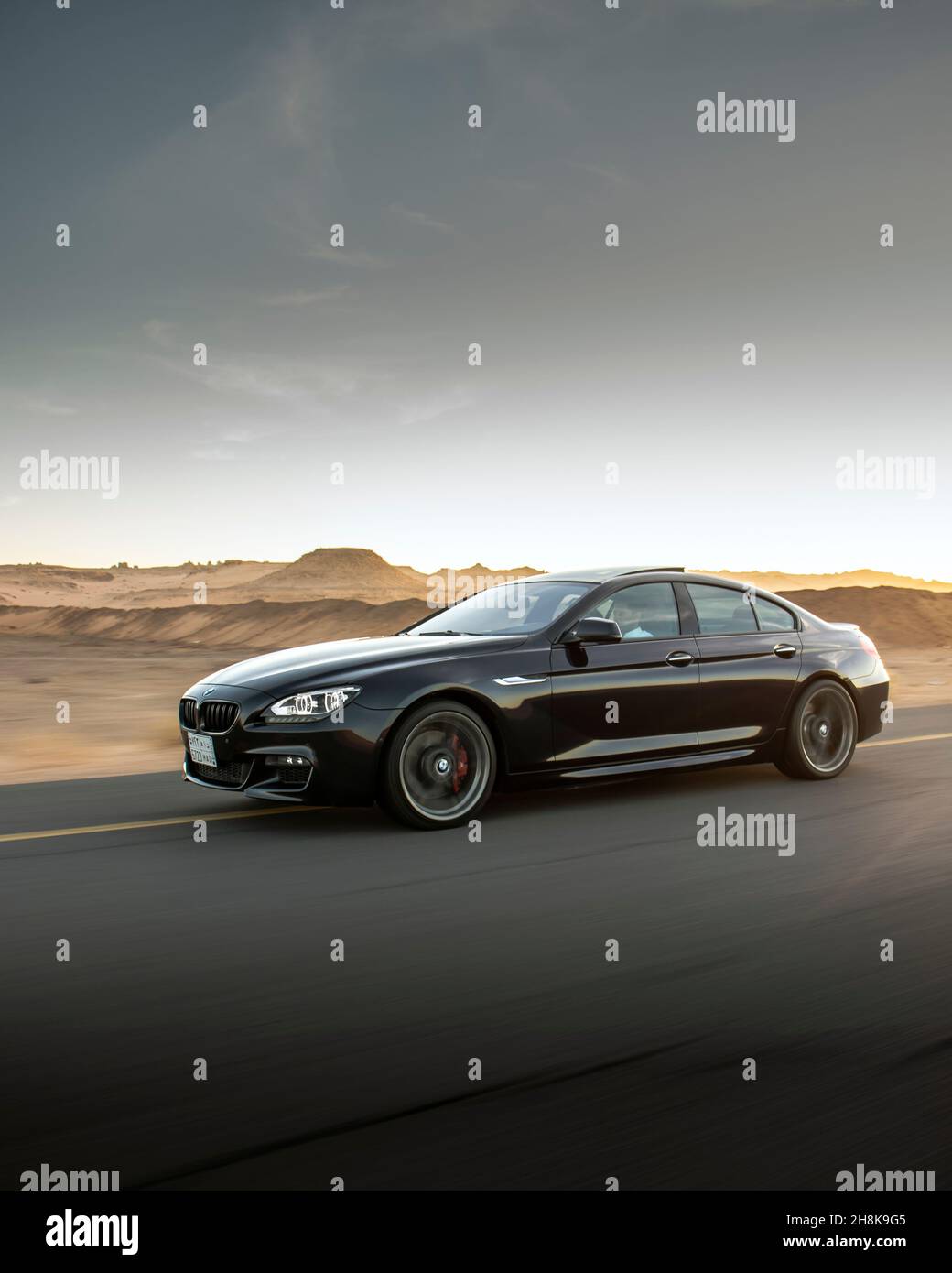 BMW photoshoot at sunset BLACK Stock Photo - Alamy