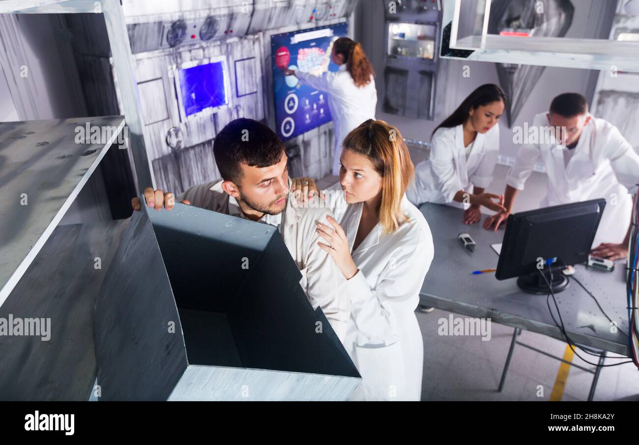 Adults in quest room Stock Photo - Alamy