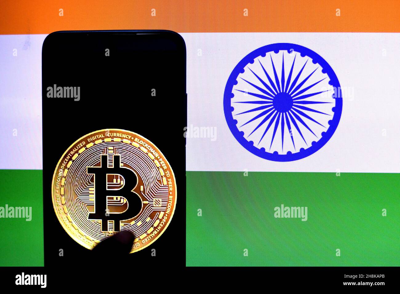 India. 30th Nov, 2021. In this photo illustration, a Bitcoin logo seen ...