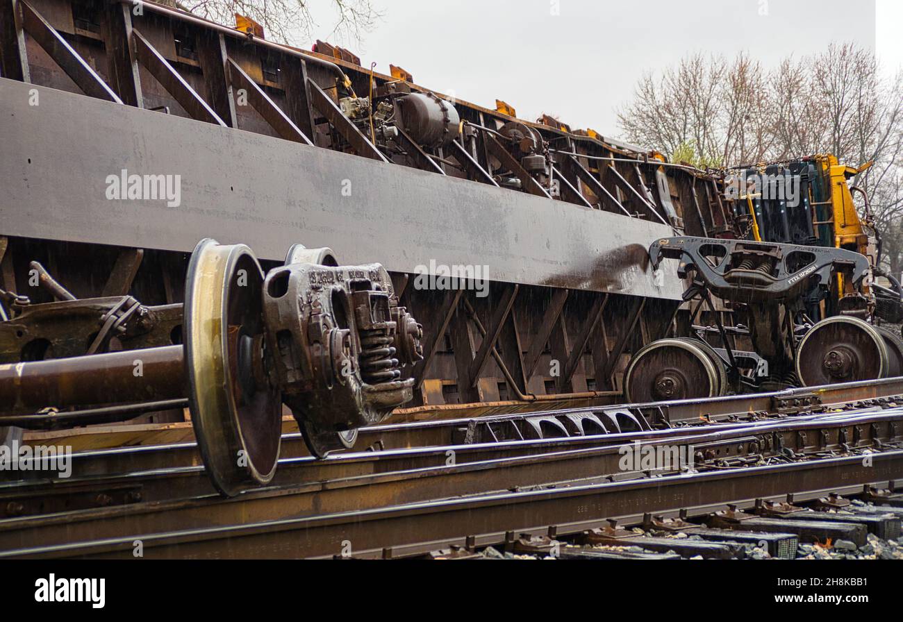 Up-close of a derailed train car Stock Photo - Alamy