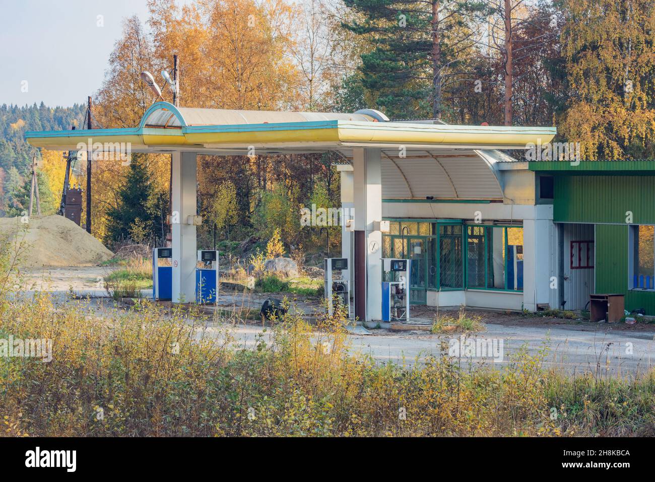 Abandoned gas station by the forest edge Stock Photo - Alamy