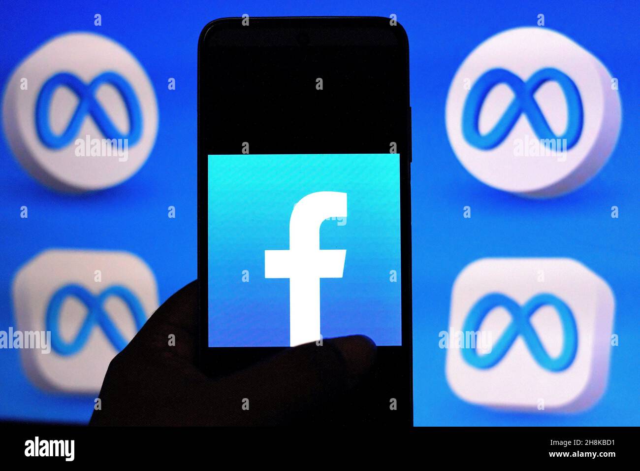 In this photo illustration, a Facebook logo seen displayed on a ...