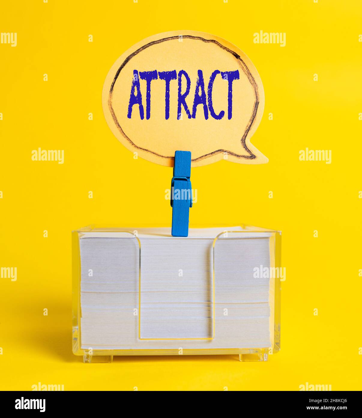 Hand writing sign Attract. Word for to draw by a physical force causing ...