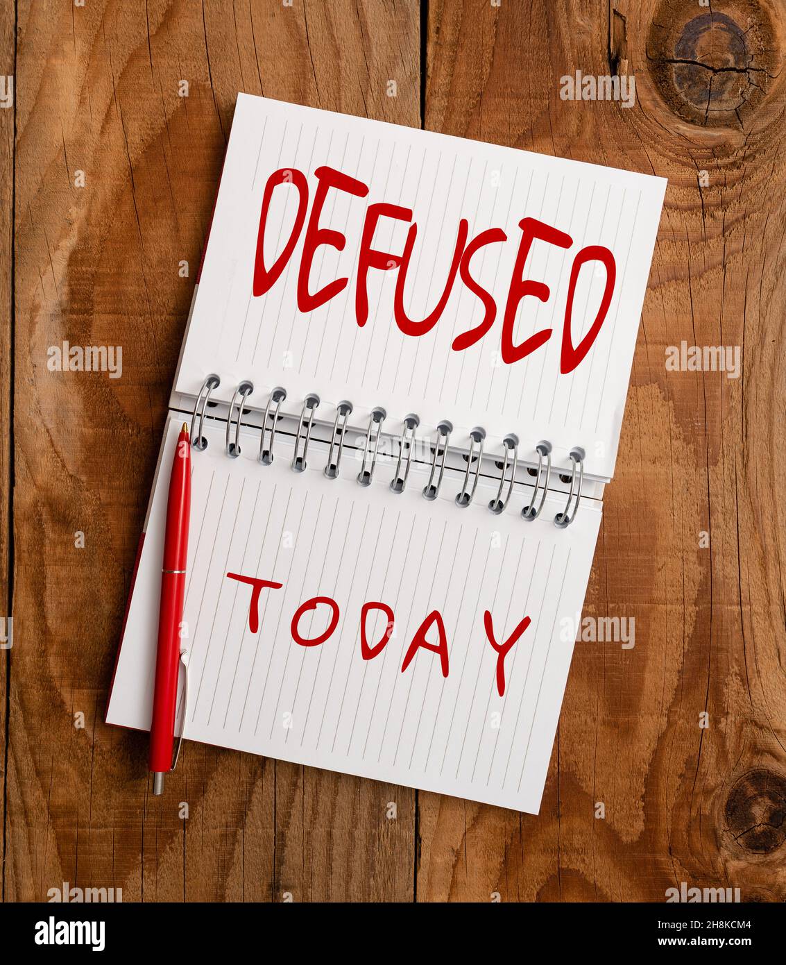 Sign displaying Defused. Word for make a difficult or dangerous ...