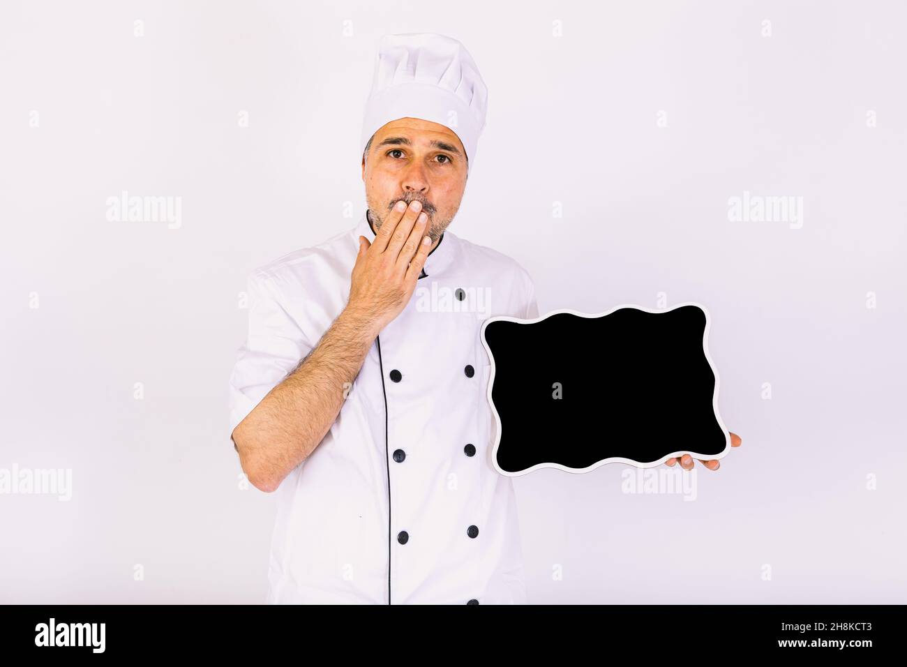 Man wearing a chefs hat hi-res stock photography and images - Alamy