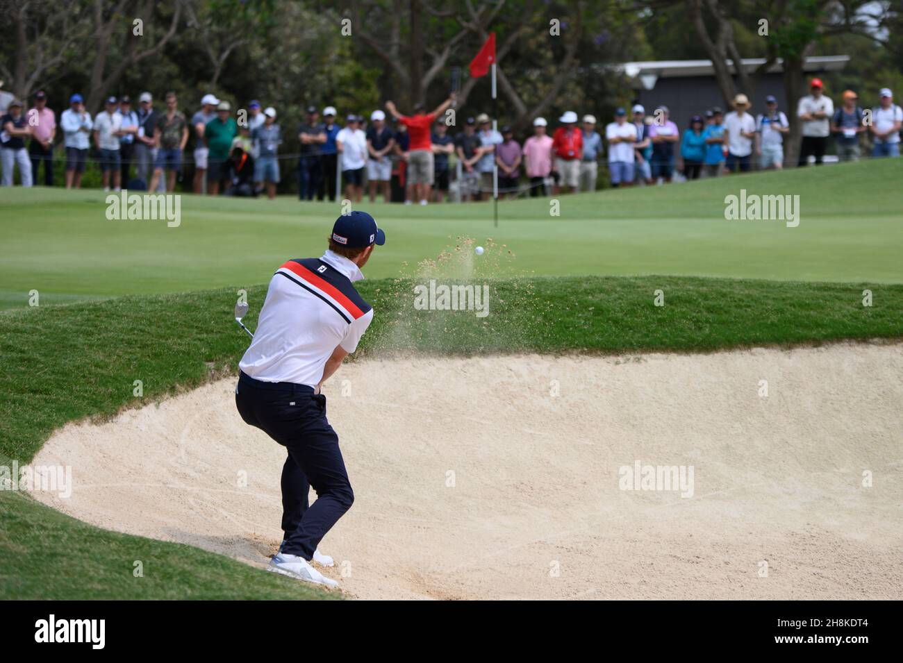Aaron Wilkin (AUS) hits out of the bunker Credit: Speed Media/Alamy ...