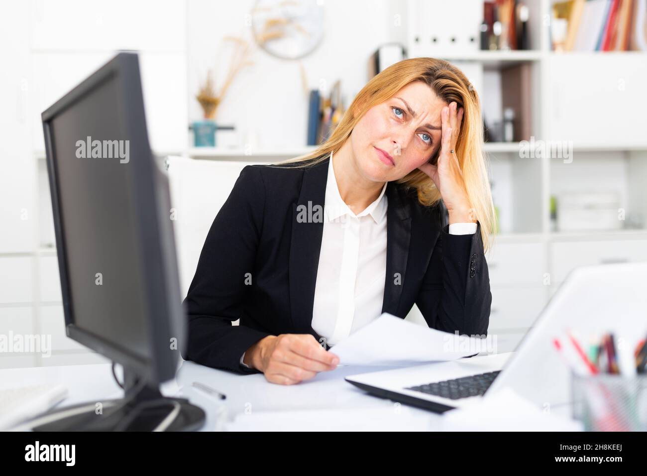 Closeup worried woman working with computer hi-res stock photography ...