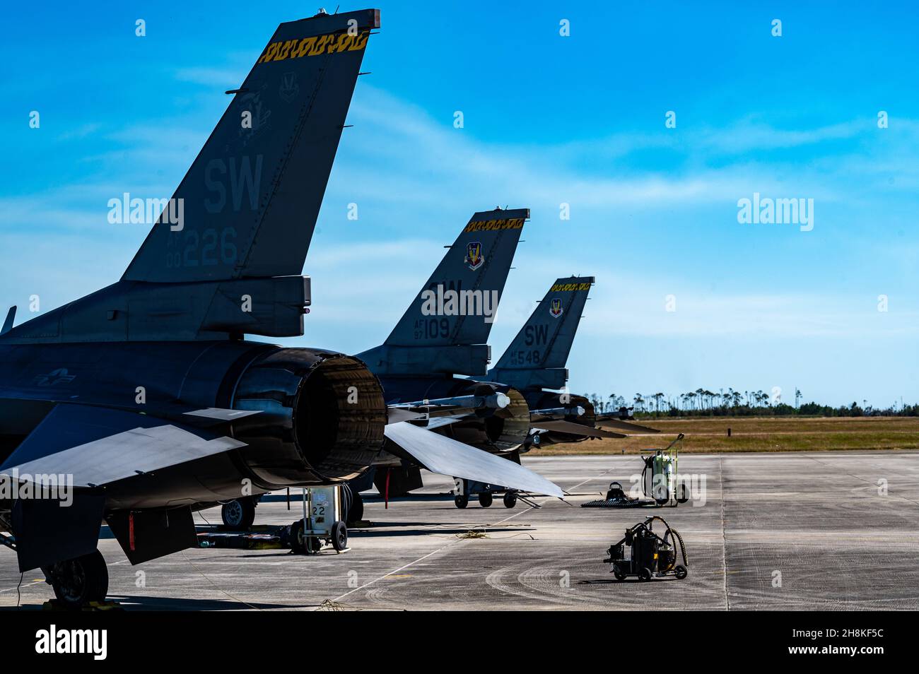 F-16 Vipers sit on the flightline during exercise Iron Hand 22-2 at ...