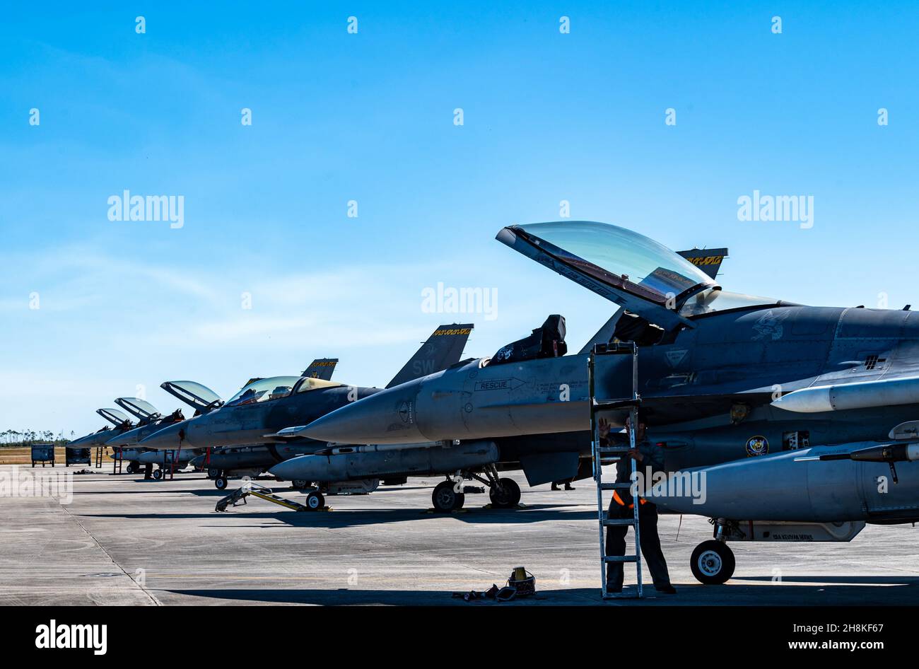 F-16 Vipers sit on the flightline during exercise Iron Hand 22-2 at ...