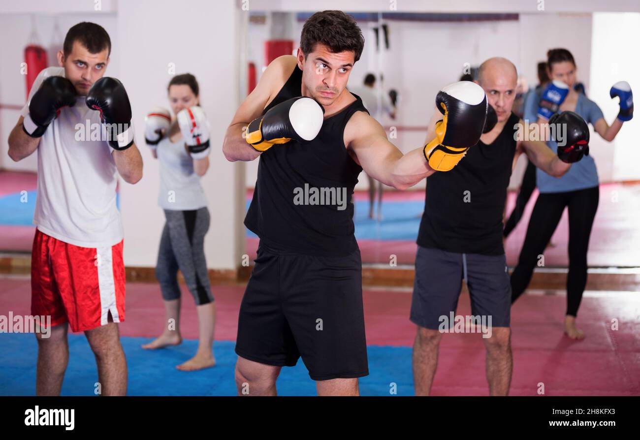 Group of people of different ages sparring Stock Photo - Alamy
