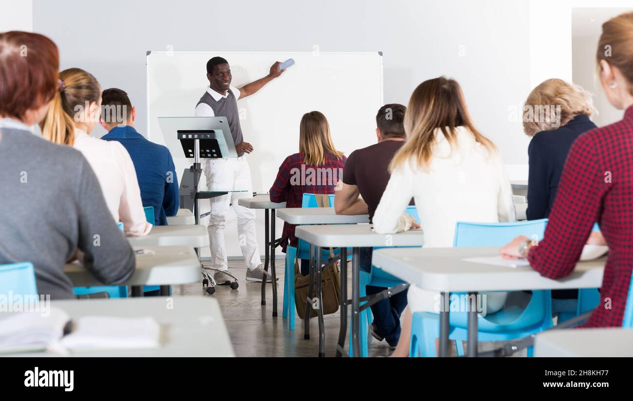 African American student answering at whiteboard Stock Photo - Alamy