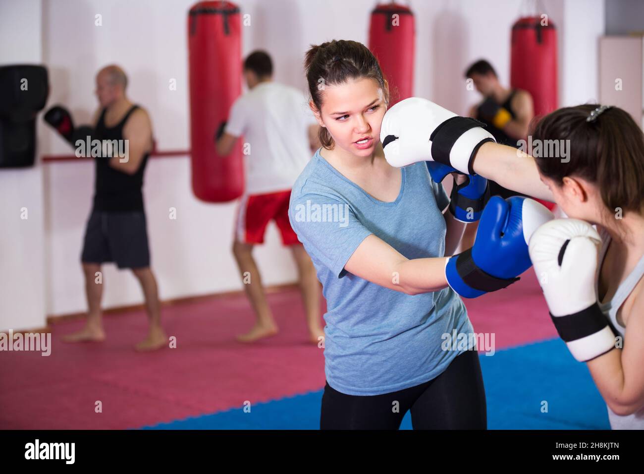 Girl is having sparring with partner Stock Photo - Alamy
