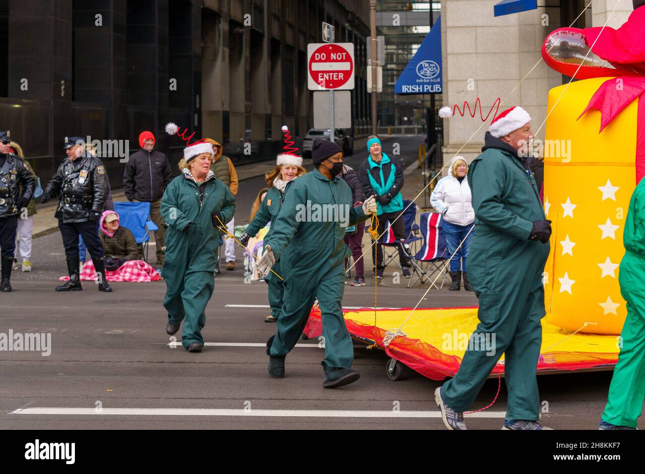 Philadelphia, PA, USA - November 25, 2021: Handlers of the large elf ...