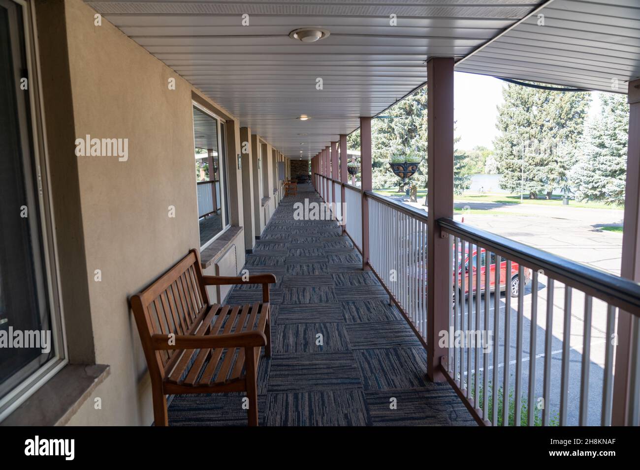 Outdoor exterior corridors of a motel on the second floor Stock Photo ...