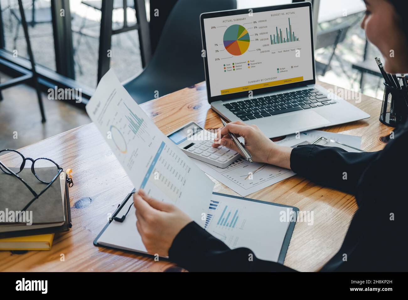 Business woman using calculator for analysis maketing plan, Accountant ...