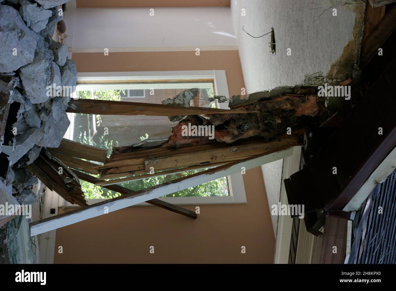 Piles of debris collect in this abandoned home renovation project which ...