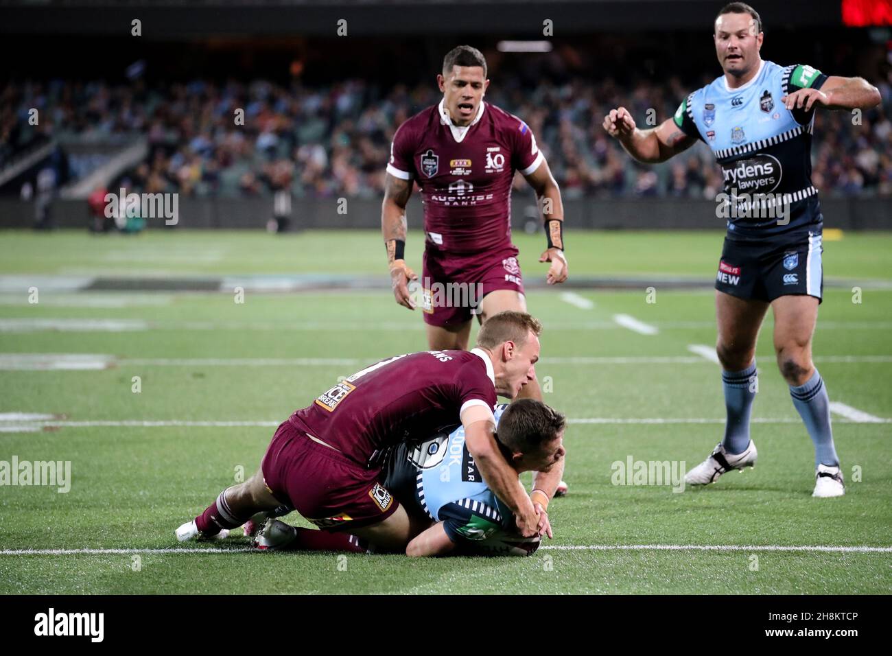 Damien Cook of the NSW Blues scores a try during game one of the 2020 ...