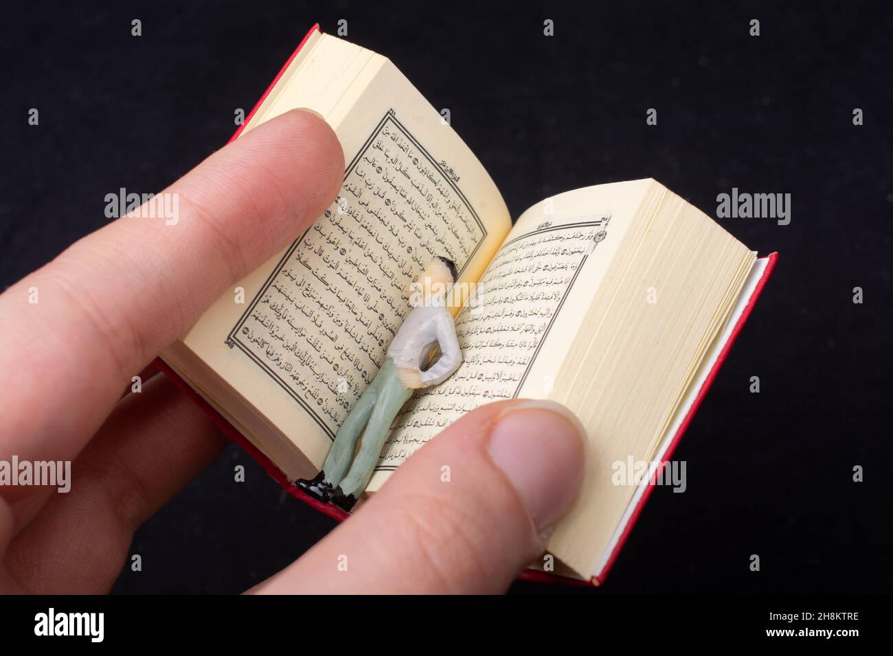 Islamic Holy Book Quran mini size Stock Photo - Alamy