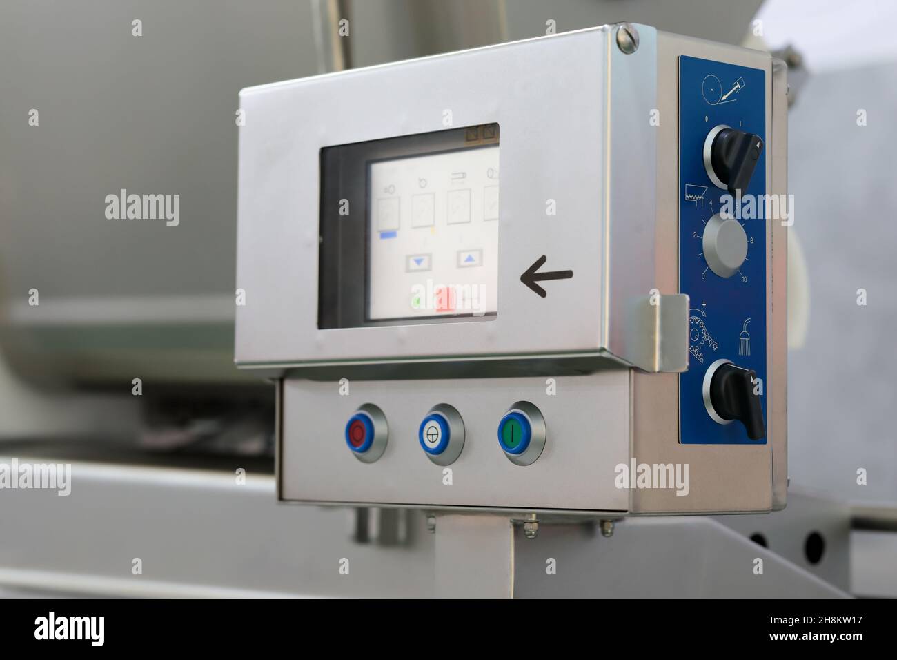 Control console of manufacturing machine in a food production factory ...