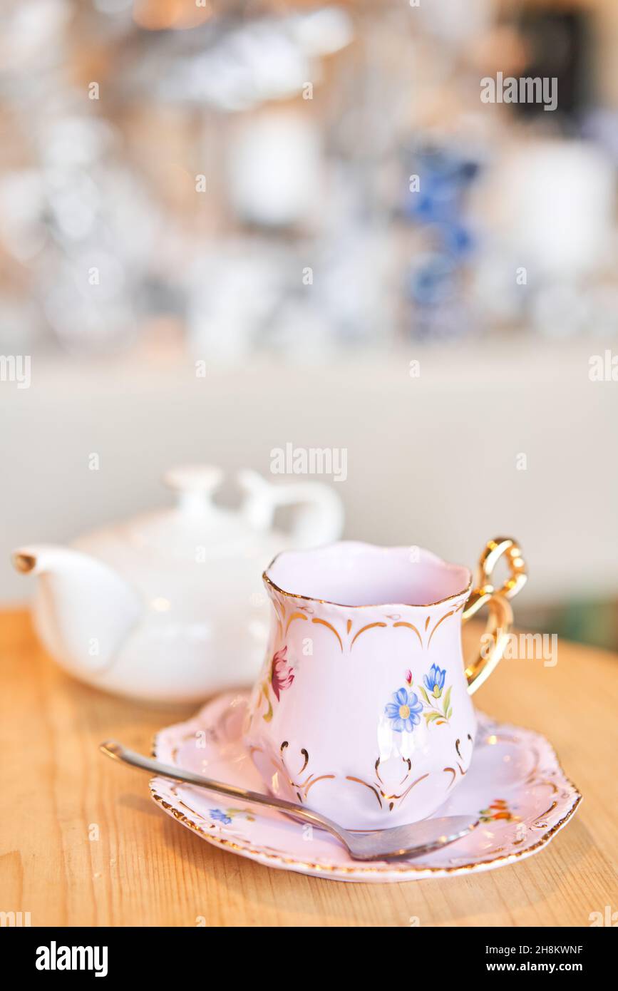 teapot and cup. A magnificent porcelain tea set with a fragrant tea ...
