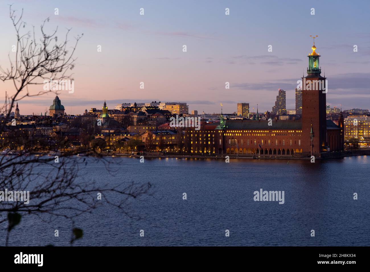Beautiful panorama of Stockholm at night with sea, buildings, boats and ...