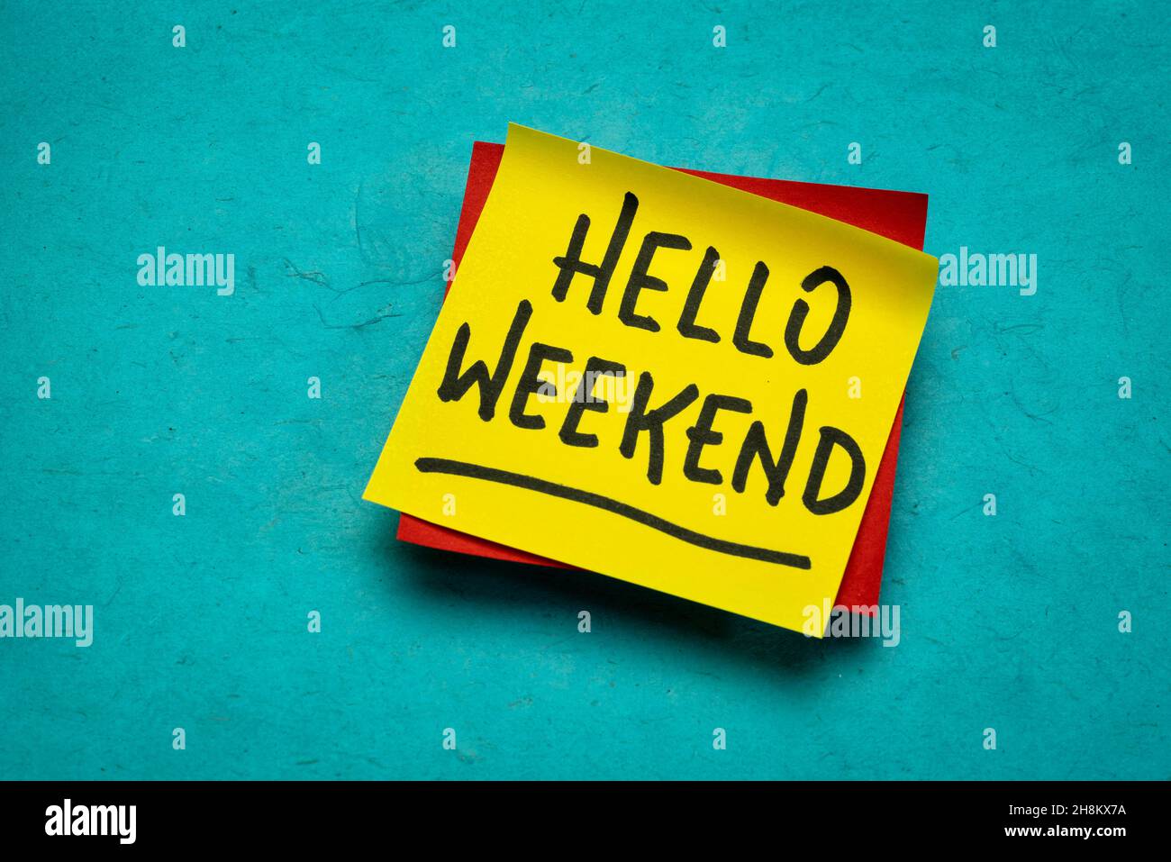 hello weekend - handwriting on a sticky note, cheerful message Stock ...