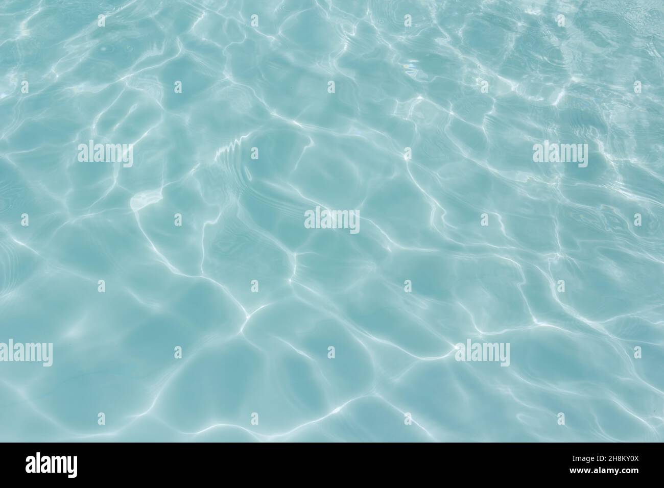 light blue water texture pattern in swimming pool background Stock Photo - Alamy