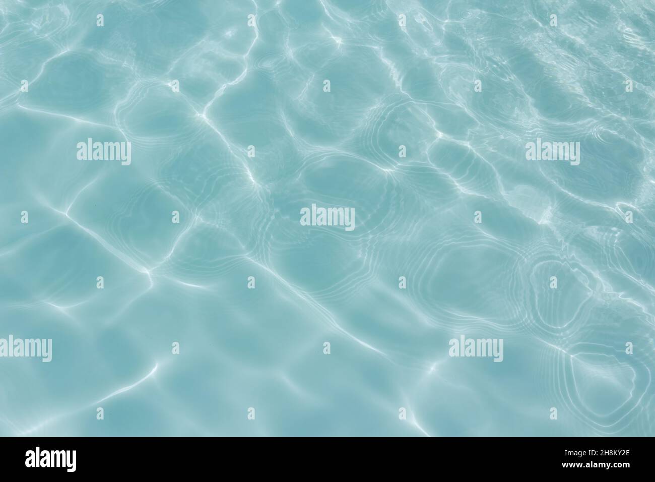 light blue water texture pattern in swimming pool background Stock Photo - Alamy