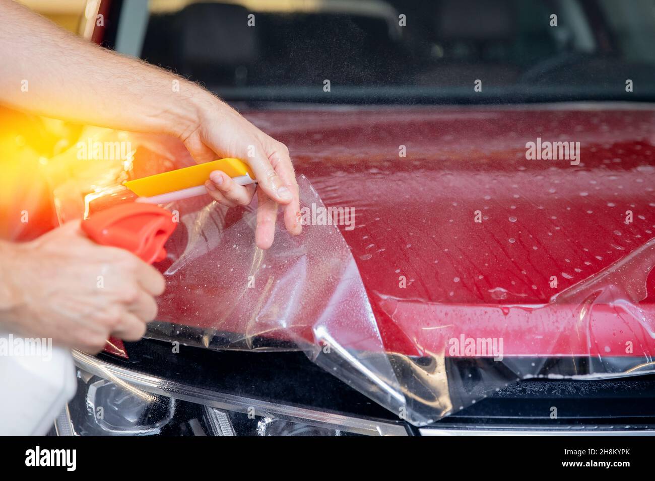 Concept transparent protection for car paint. Instal protective vinyl ...