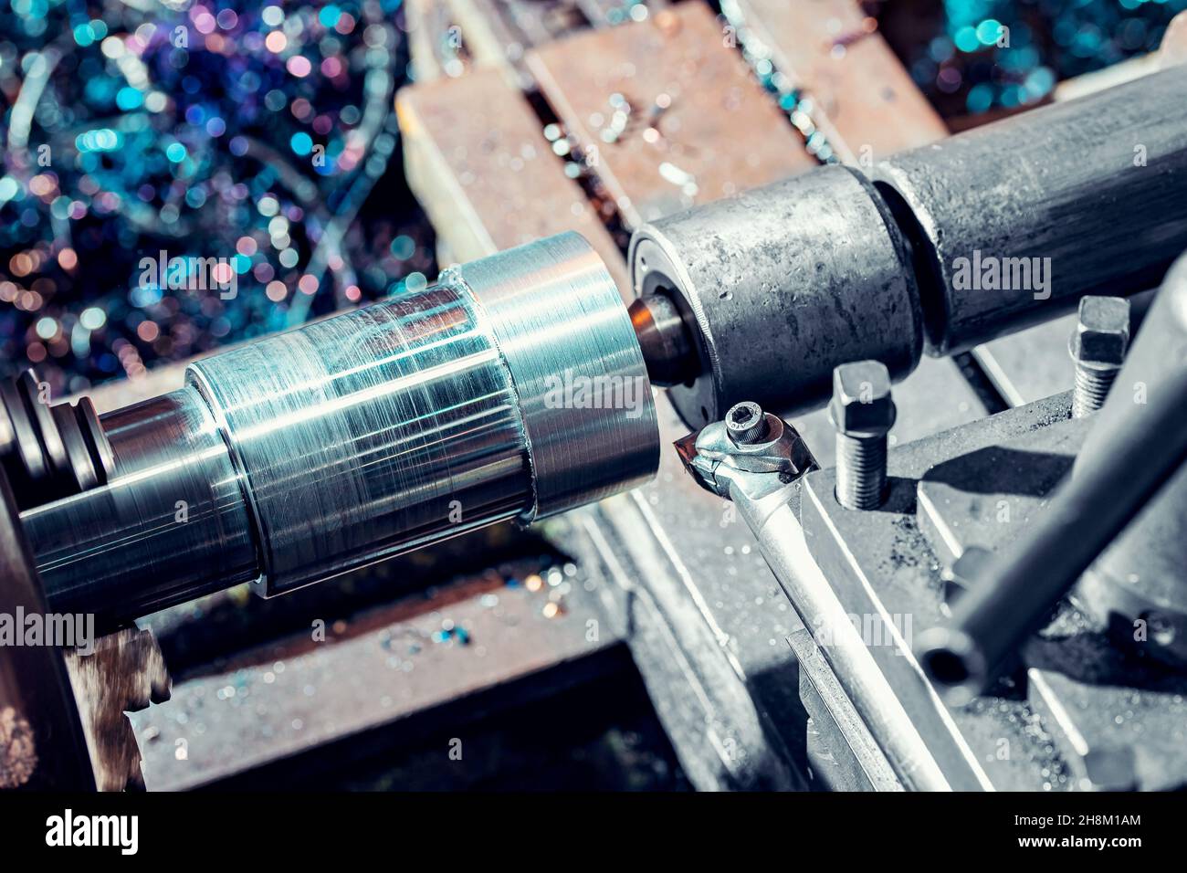 Machine iron tools CNC cut of metal with light spark, technology modern ...