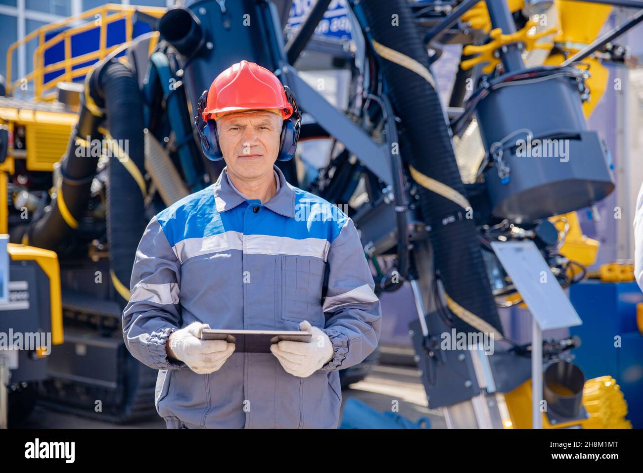 Concept smart online Industry. Offshore worker inspect with tablet ...