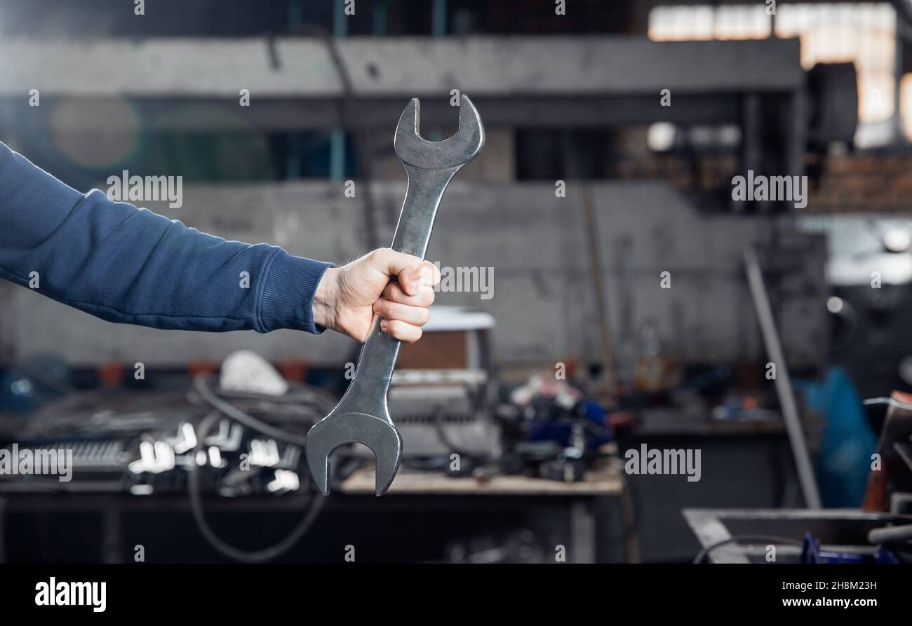 Mechanic working hard on car hi-res stock photography and images - Alamy
