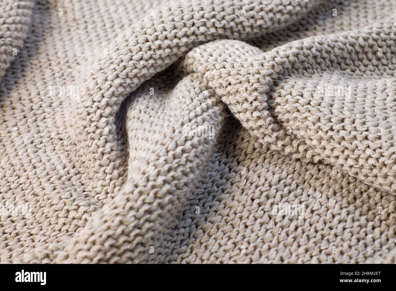 Soft light natural texture of knitted wool textile material background ...