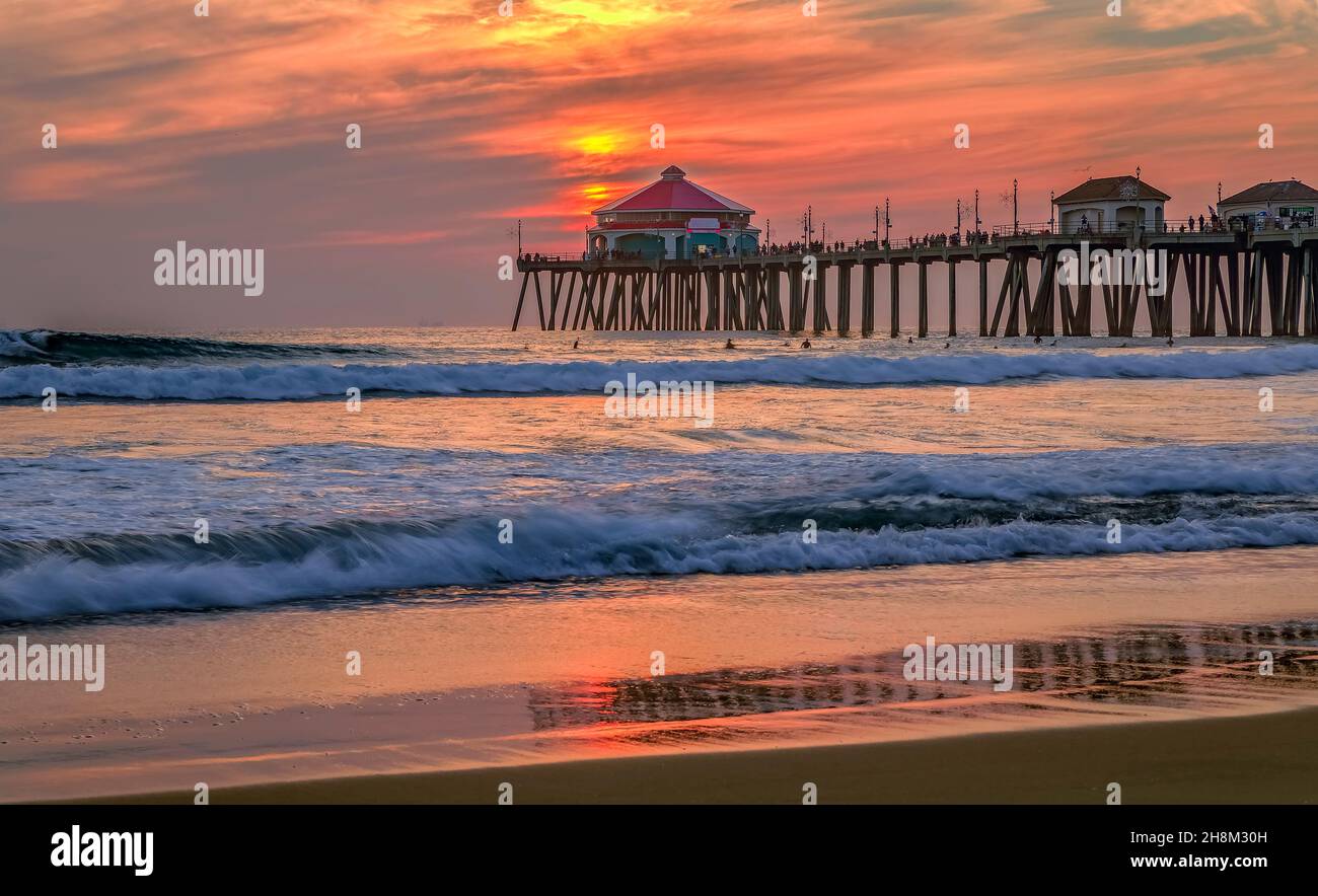 Incredible colors of sunset by Huntington Beach Pier, in the famous ...