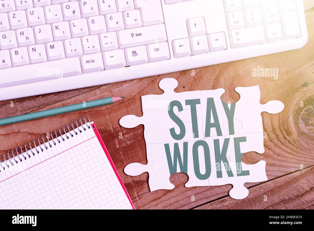 Hand writing sign Stay Woke. Concept meaning being aware of your ...