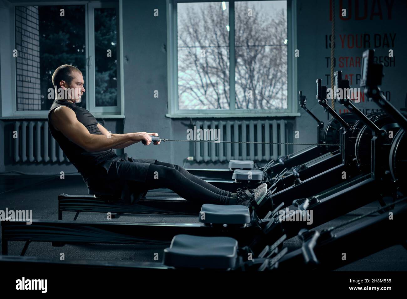 Male bodybuilder flexing muscles side hi-res stock photography and ...