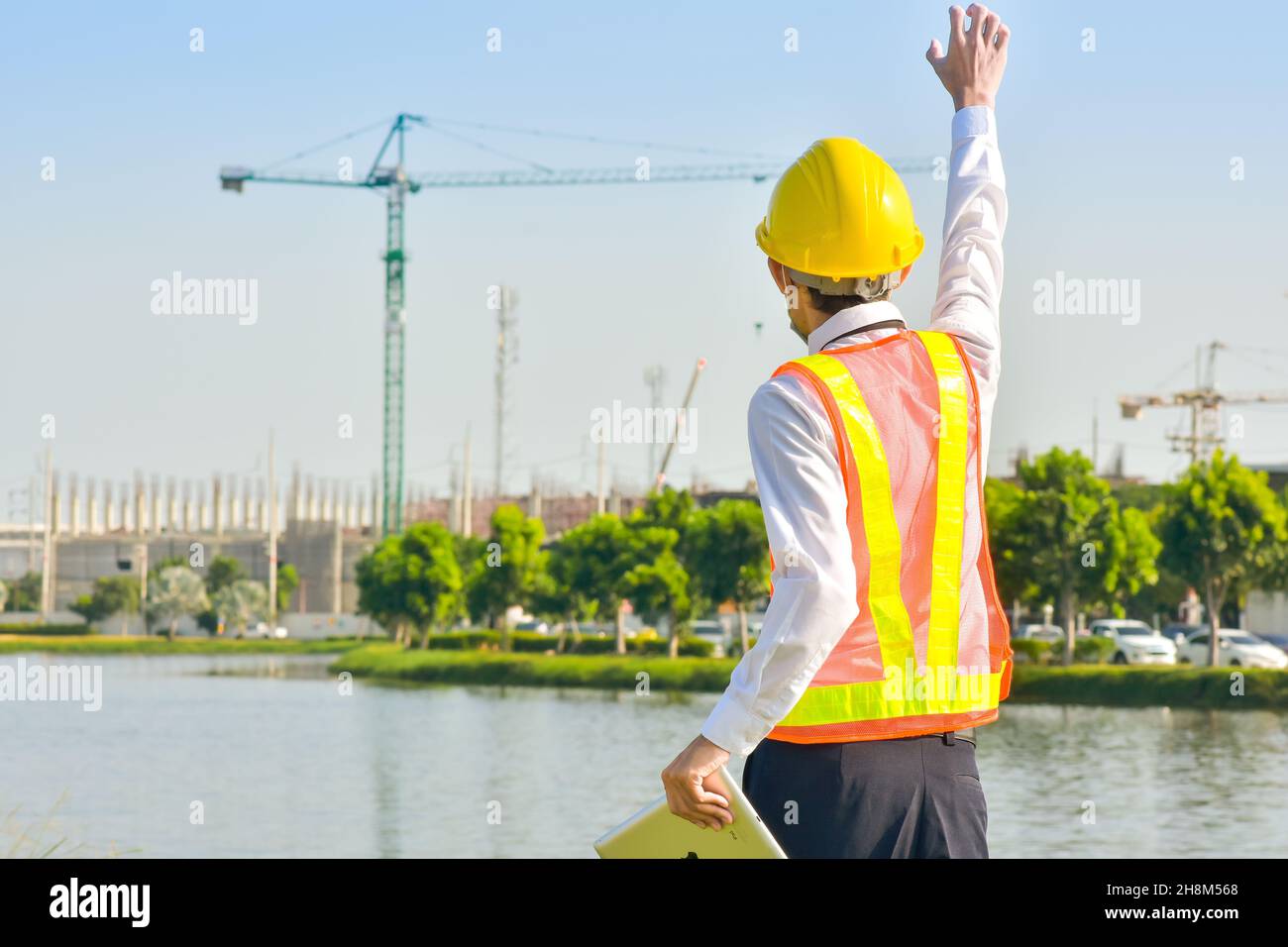 Professional engineer standing outdoors hi-res stock photography and ...