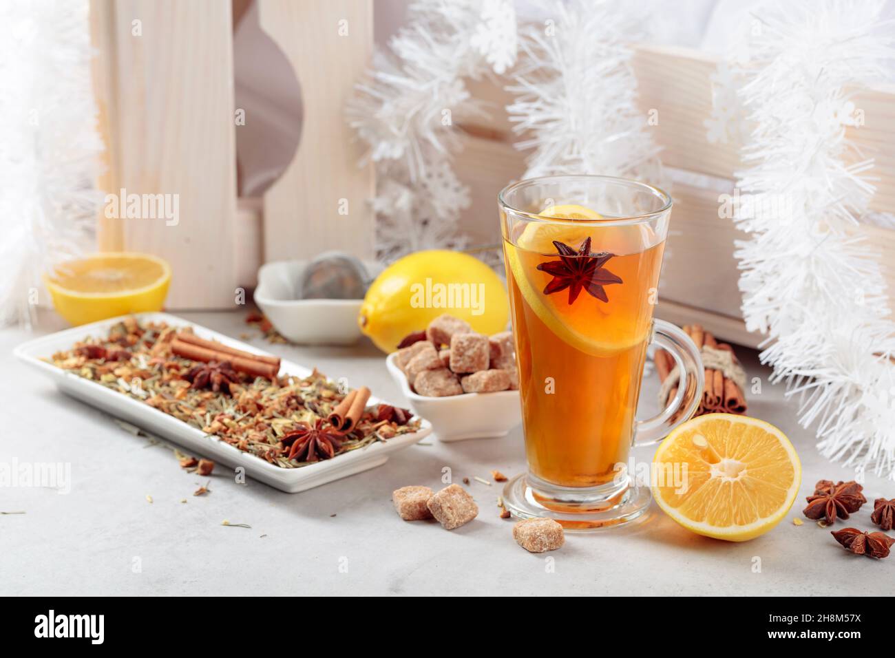 Christmas tea with cinnamon, lemon, anise, and dried herbs. Herbal tea ...