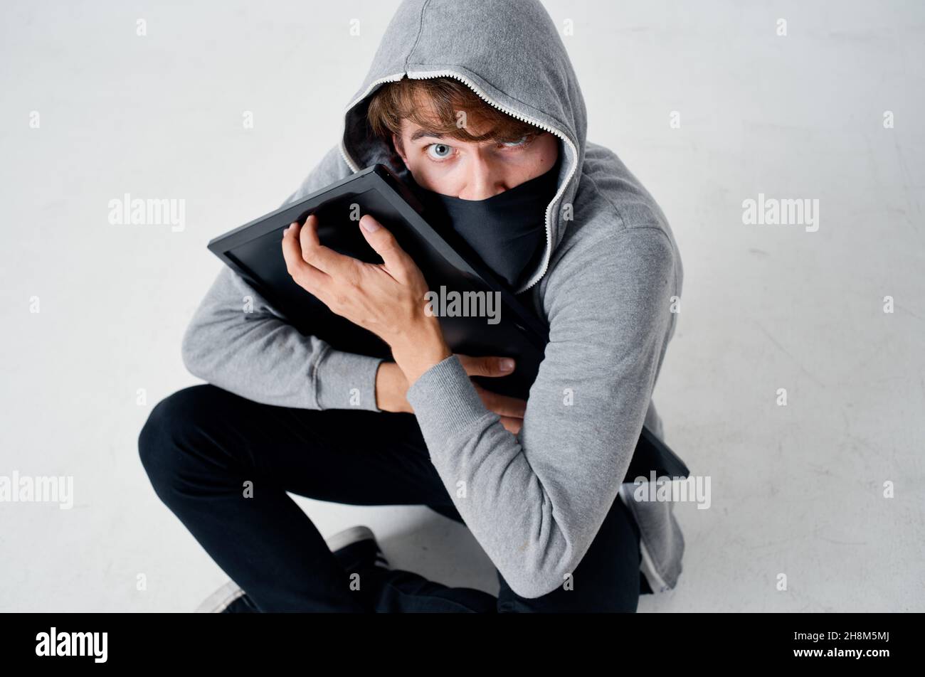 hacker hooded head hacking technology security light background Stock ...