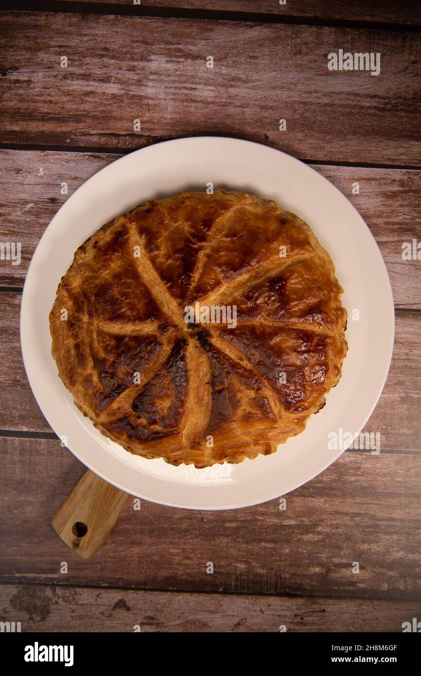 Pithiviers, Pastry dough Galette des Rois with cream frangipane with ...