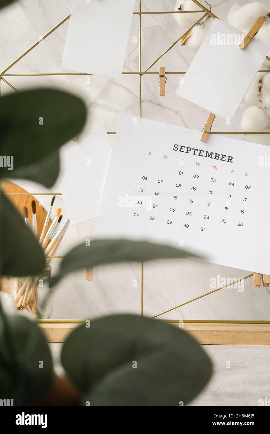 SEPTEMBER CALENDAR cards and posters mock ups on grid board. Copy space ...