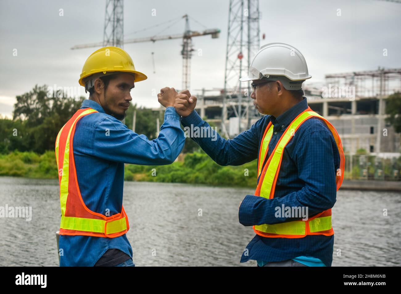 Concept cooperation handshake engineer hi-res stock photography and ...