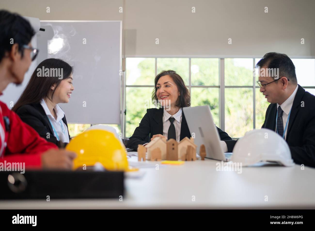 Happy people business team talking discussion construction project ...