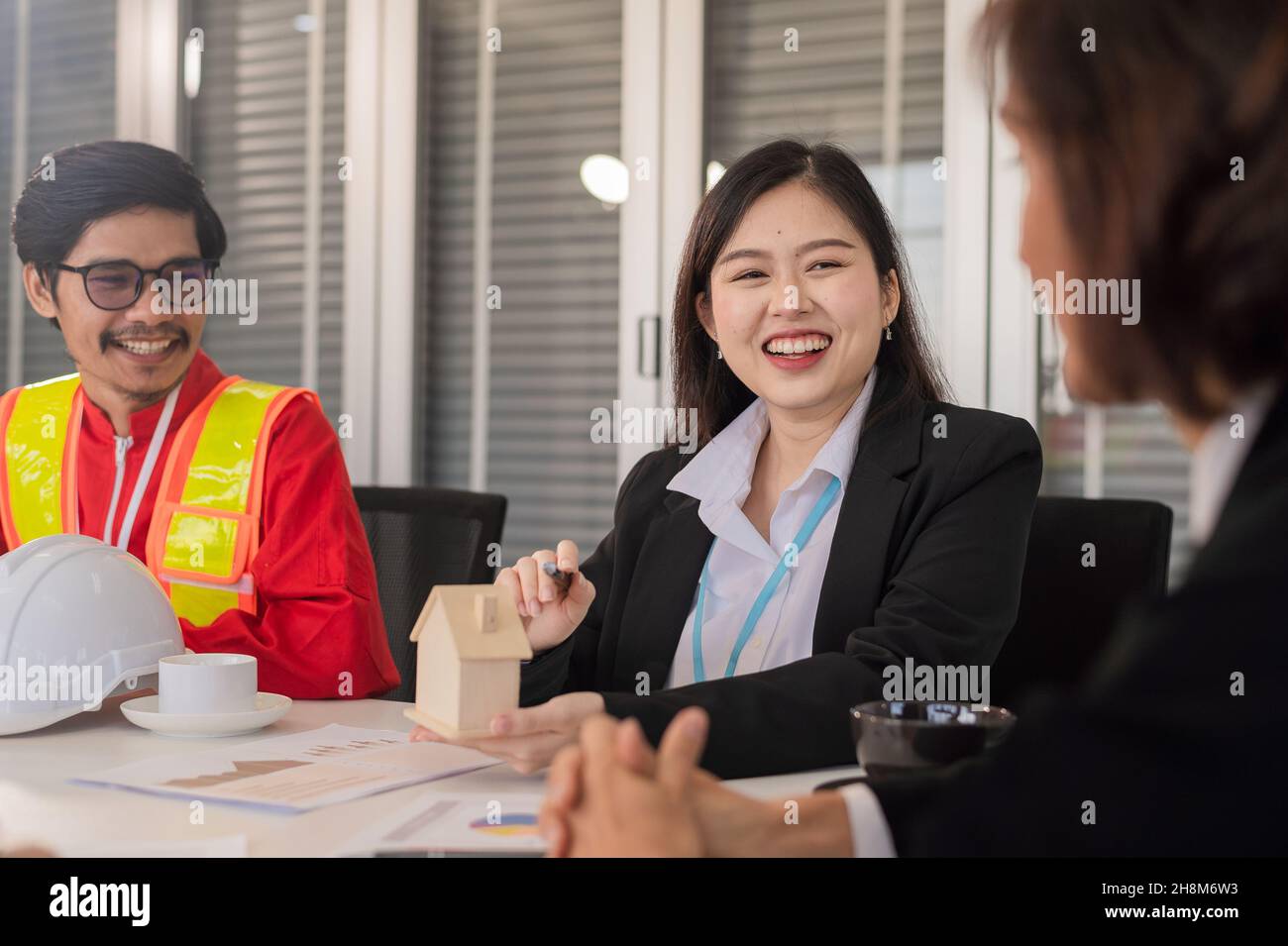 Happy people business team talking discussion construction project ...